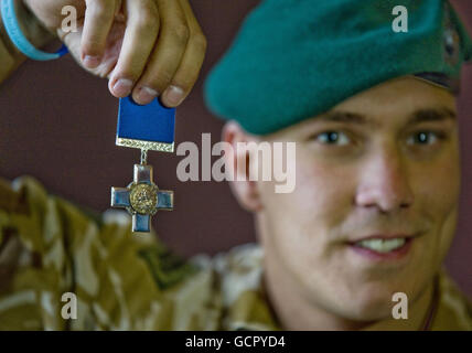 Lance Corporal Matt Croucher presents George Cross to the Imperial War ...