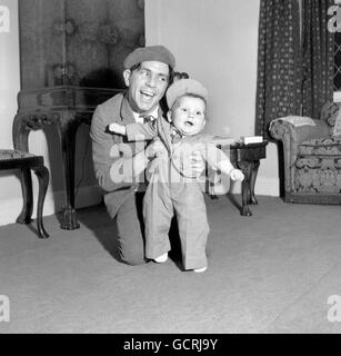 Norman Wisdom with baby son Nicholas. March 1953 D1491-001 Stock Photo ...
