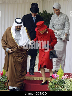 Queen Elizabeth II is helped step off a raised Dias by the Duke of ...