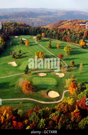 landscape fall foliage at Golf Course flag in hole at front Stock Photo ...