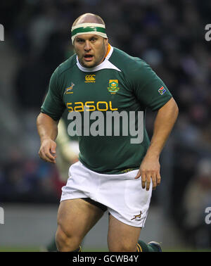 South Africa's CJ van der Linde, center with ball, celebrates his try ...