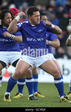 Samoa players perform the Siva Tau during the Rugby League World Cup ...