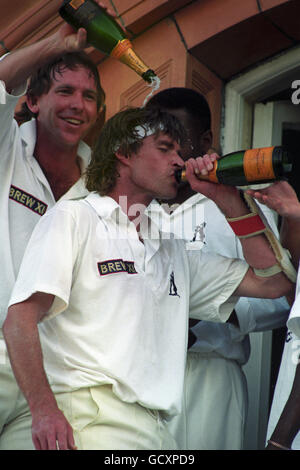 Warwickshire cricket Captain Dermot Reeve is assisted by his daughter ...
