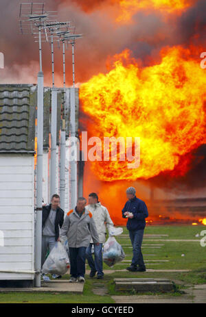 NOTE: FACES PIXELATED TO PROTECT IDENTITY. Police and immigration ...