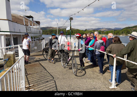 Passengers on Ambleside Pier at Waterhead on Lake Windermere, waiting ...