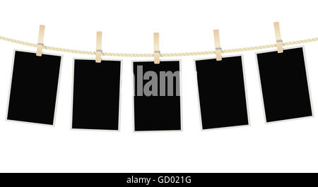 clothespins hanging on a rope Stock Photo - Alamy