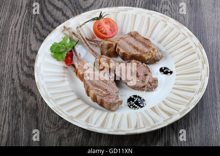 Lamb Frenched Rack grilled rib bone Stock Photo - Alamy