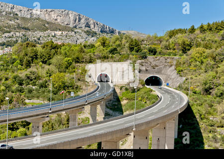 croatian motorway with curved viaducts and tunnel entrance near klis ...