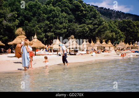 Spain, Mallorca, German tourists on the beach in the sun Stock Photo ...