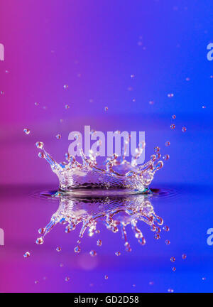 color photo of a water droplet splash front view Stock Photo - Alamy