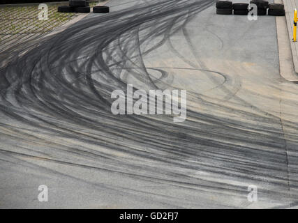 Tyre burnout marks on asphalt road Stock Photo: 111308969 - Alamy
