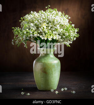 Bouquet of flowers lily of the valley on pink pastel background ...