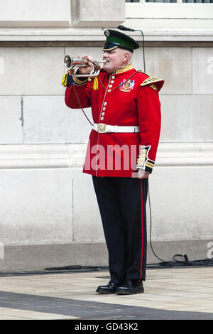 A bugler plays the last post during a special remembrance blessing at ...