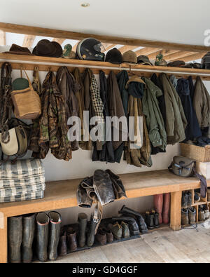 Coat and boot storage Stock Photo - Alamy