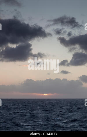 Sunset at sea near Bluff, New Zealand Stock Photo - Alamy