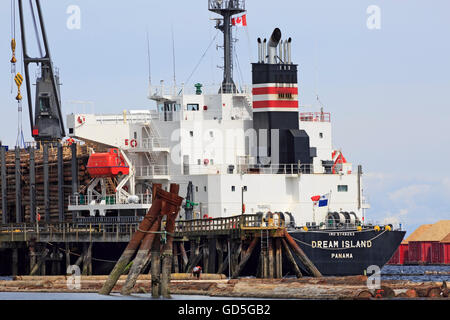 Ship loading logs, Crofton, Vancouver island, British Columbia Stock ...