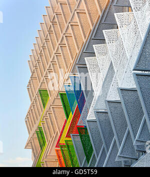 Exterior facade with adjustable triangular perforated steel shutters ...