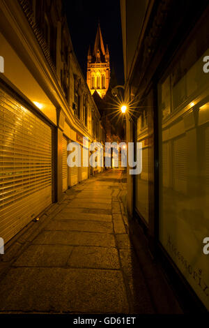 Street scene and view to Truro cathedral with three spires. Quay Street ...