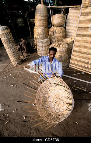 A man making eco-friendly bamboo strips basket, Tamil Nadu, South India ...