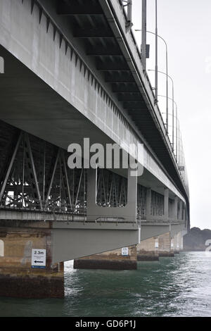 Underside of wide concrete bridge span over intercoastal waterway Stock ...