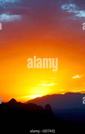 the blurred sun falling down arabian mountain in oman Stock Photo - Alamy