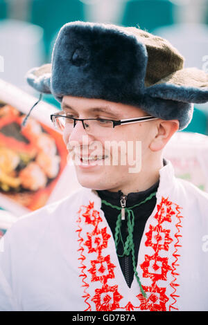 Beautiful young man in Belarusian national costume isolated on white ...