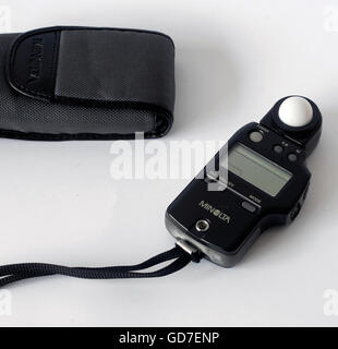 Photograph of a Minolta brand manual photometer, isolated on white ...