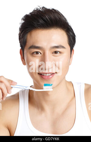 Brushing teeth, studio portrait and black man with toothbrush for mature dental wellness ...
