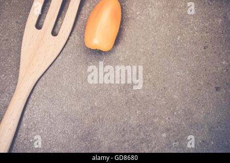 sweet orange pepperoni on a stone worktop - directly above view Stock ...