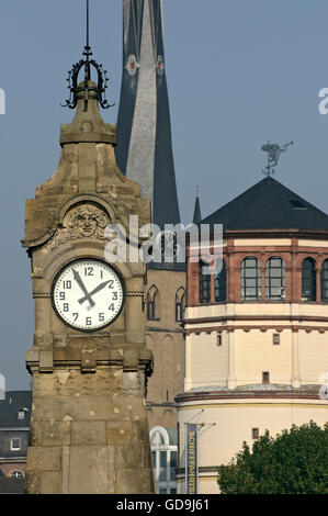 Rhine Promenade with Pegeluhr clock tower, Schlossturm tower and St ...