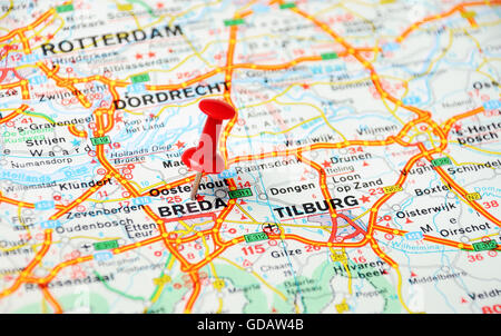 Close up of Breda , Netherlands map with red pin and airplane toy ...