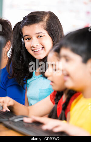 5 kids Girls and Boys School Student Sitting Classroom Computer ...