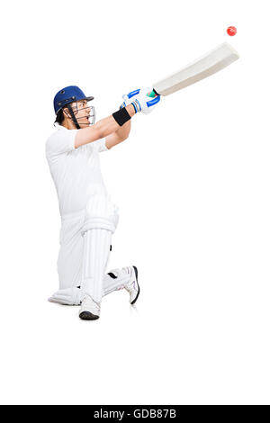 Cricket player hitting ball Stock Photo - Alamy