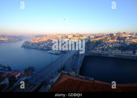Iconic classic view over Porto at sunset Portugal. Ponte de D. Luis I ...