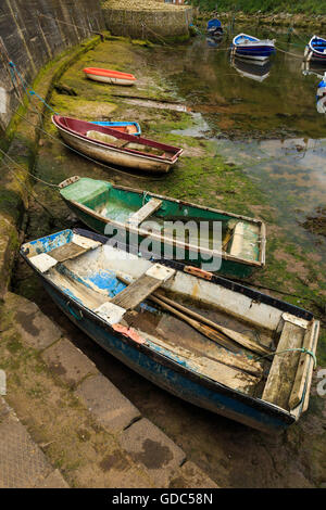 Fishing boats stranded in Staithes Harbour, North Yorkshire, at low ...