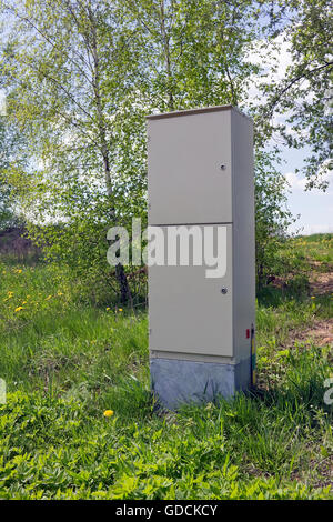 green electricity box station grass road Stock Photo - Alamy