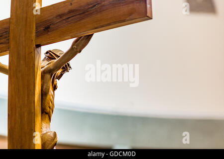 rear view of a wooden sculpture of Jesus Christ in cross Stock Photo ...