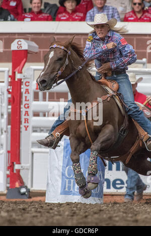 Ladies barrel racer at the Calgary Stampede Rodeo Stock Photo - Alamy
