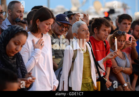 People lit candles, laid down flowers at the memorial on ...