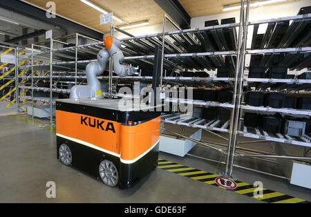 Augsburg, Germany. 14th July, 2016. A Kuka robot drives towards a gate ...