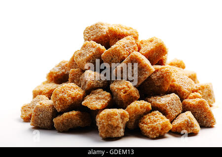 Pyramid of brown unrefined cane sugar cubes isolated on white Stock ...