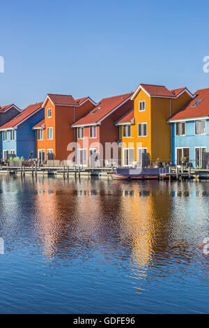 The colorful houses in Reitdiephaven in Groningen Netherlands as a long ...