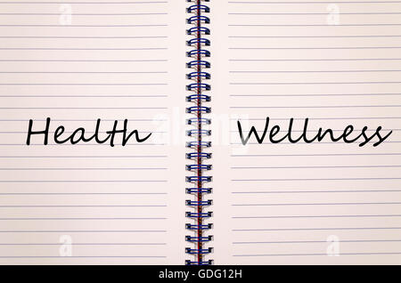 Health and wellness text concept write on notebook Stock Photo - Alamy
