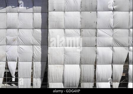 dust cover on the facade of a building under renovation Stock Photo - Alamy