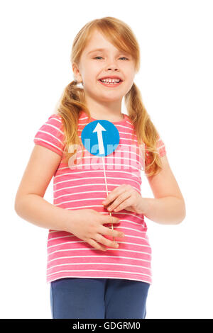 smiling girl with direction arrow sign Stock Photo - Alamy