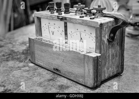Vintage analog wooden electric meter on the old table test Stock Photo ...