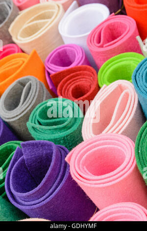 Rolls of colored fabrics. Color felt bright colors Stock Photo - Alamy