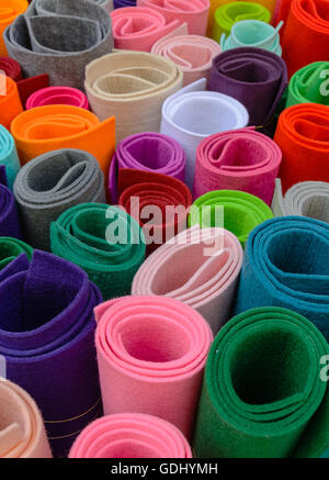 Rolls of colored fabrics. Color felt bright colors Stock Photo - Alamy