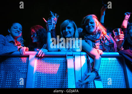 Girls in the first row at rock concert at night posing @ Zagreb ...