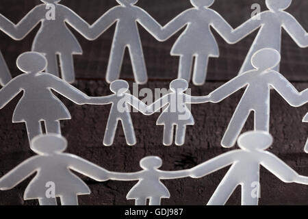 Human chain on black background Stock Photo - Alamy